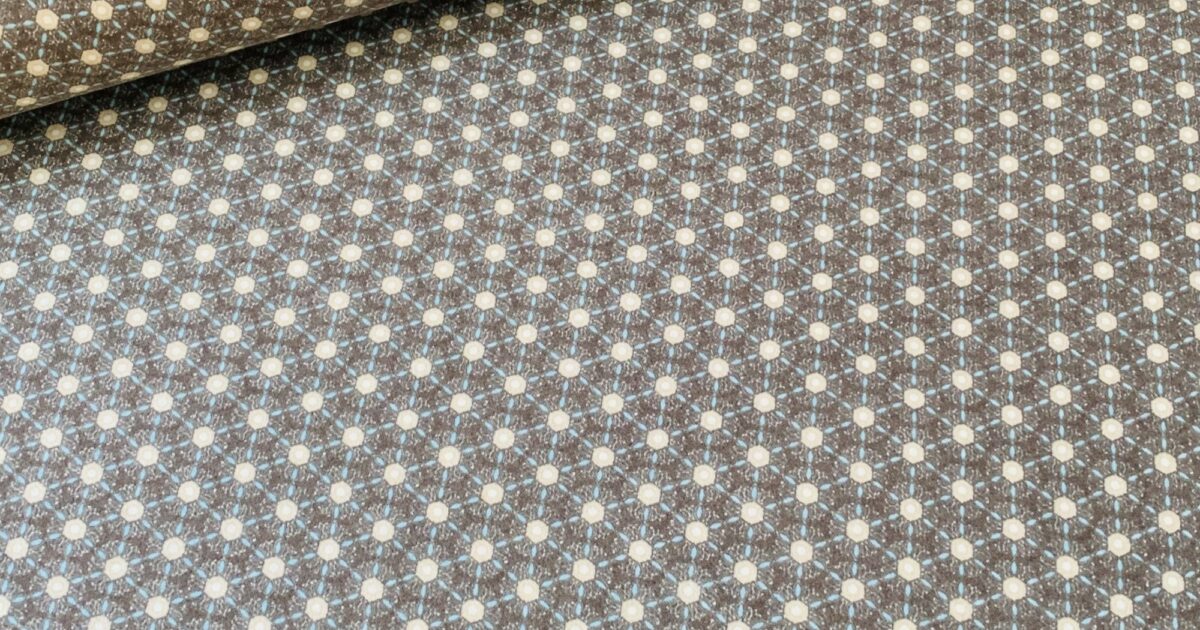 Interlock tricot wit geprint bruin/blauw figuurtjes | Megastoffen