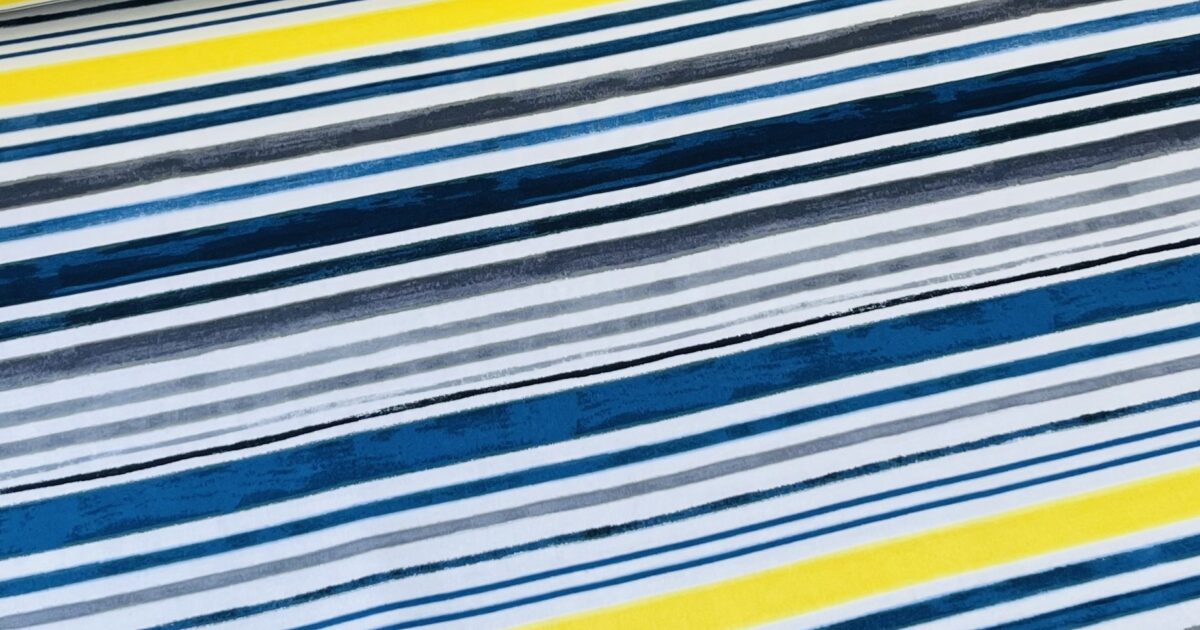 Interlock tricot strepen blauw/geel/grijs | Megastoffen